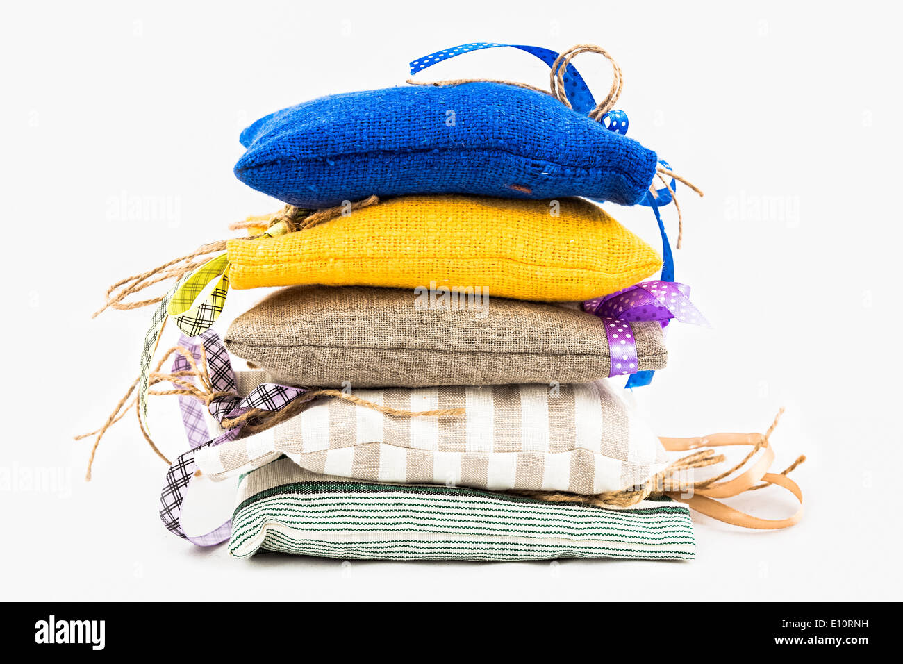 Decorative textile sachet pouches on white background Stock Photo - Alamy