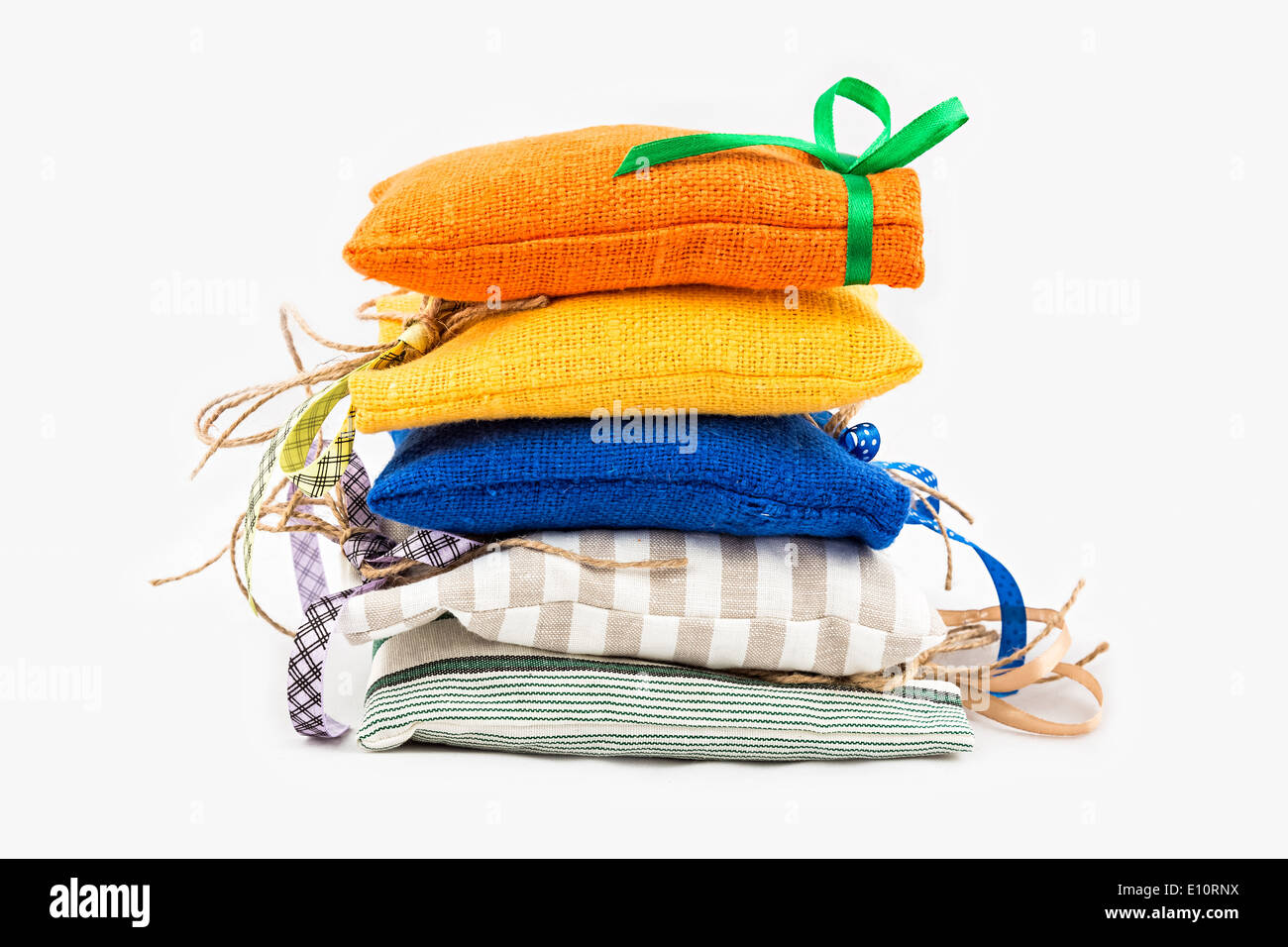 Decorative textile sachet pouches on white background Stock Photo - Alamy