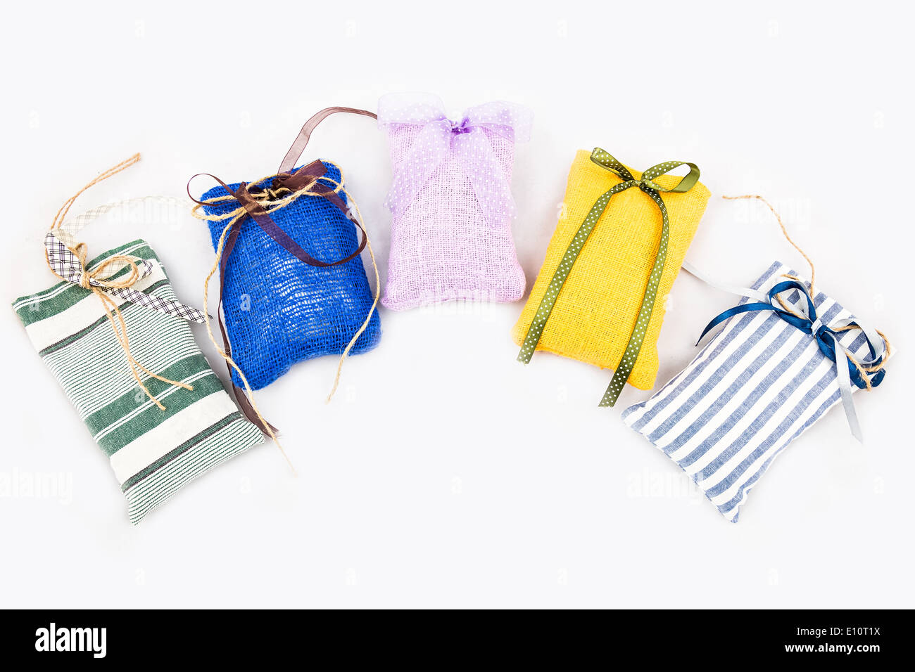 Decorative textile sachet pouches on white background Stock Photo - Alamy