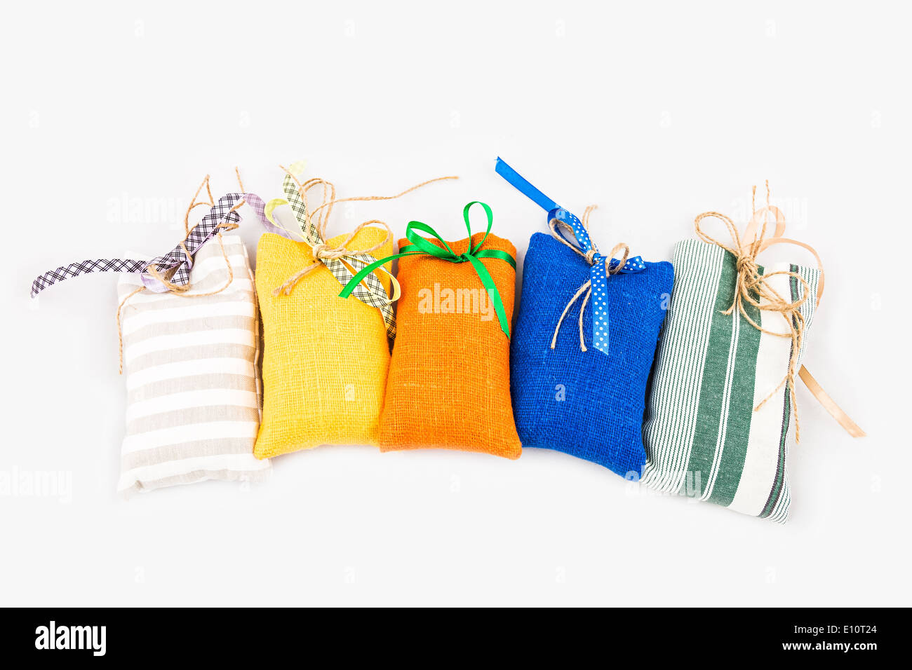 Decorative textile sachet pouches on white background Stock Photo - Alamy