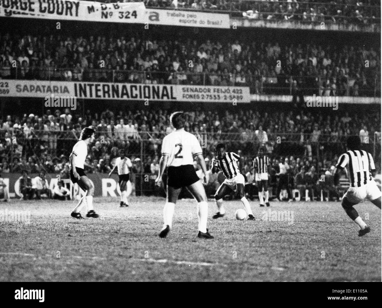 Soccer team running in Black and White Stock Photos & Images - Alamy