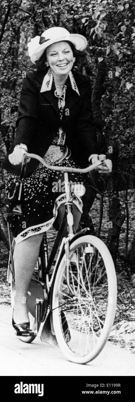 Princess Beatrix riding a bicycle Stock Photo - Alamy