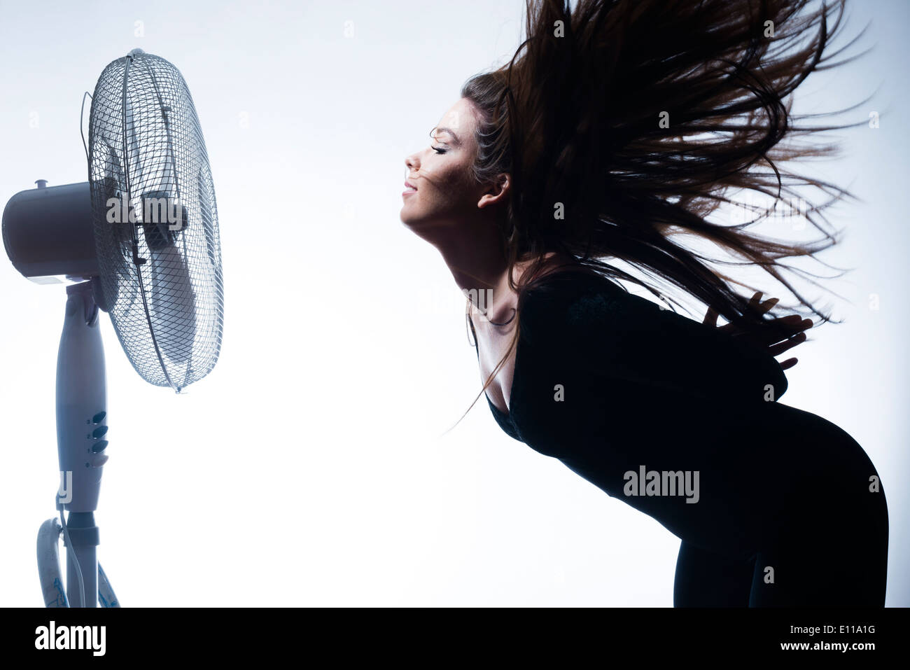 Woman hair blown by fan hi-res stock photography and images - Alamy
