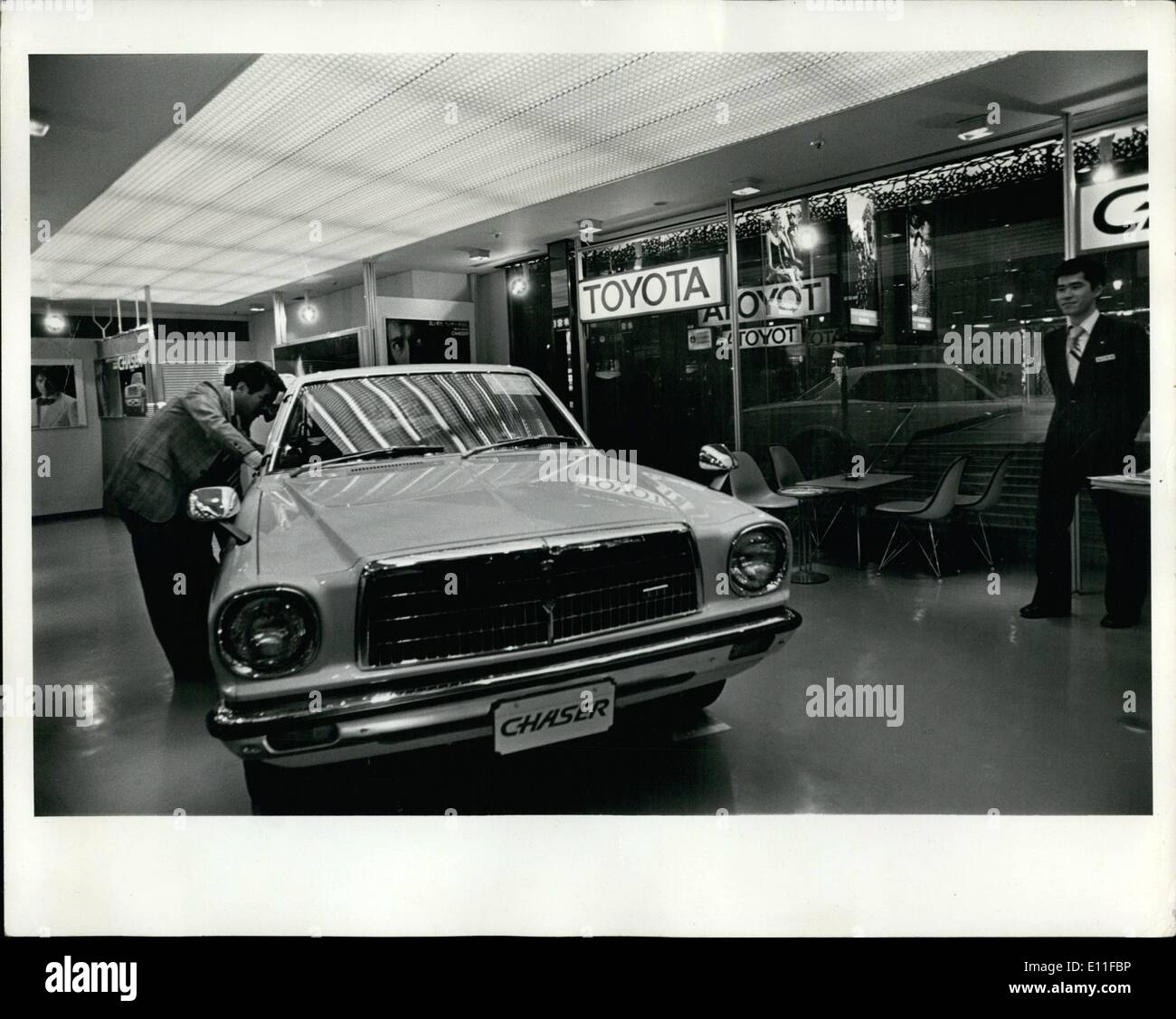 Oct. 10, 1977 - Osaka, Japan Japanese Businessmen looking at automobile ...