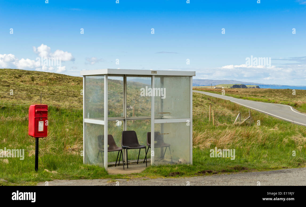 ISLE OF SKYE SCOTLAND A RURAL BUS STOP SHELTER AND THREE CHAIRS Stock ...