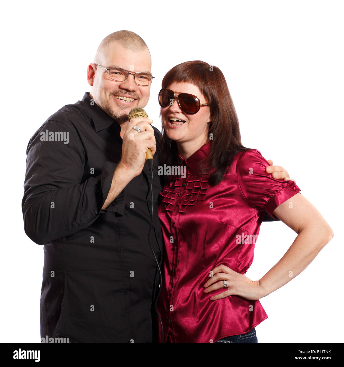 Couple sing karaoke Stock Photo - Alamy