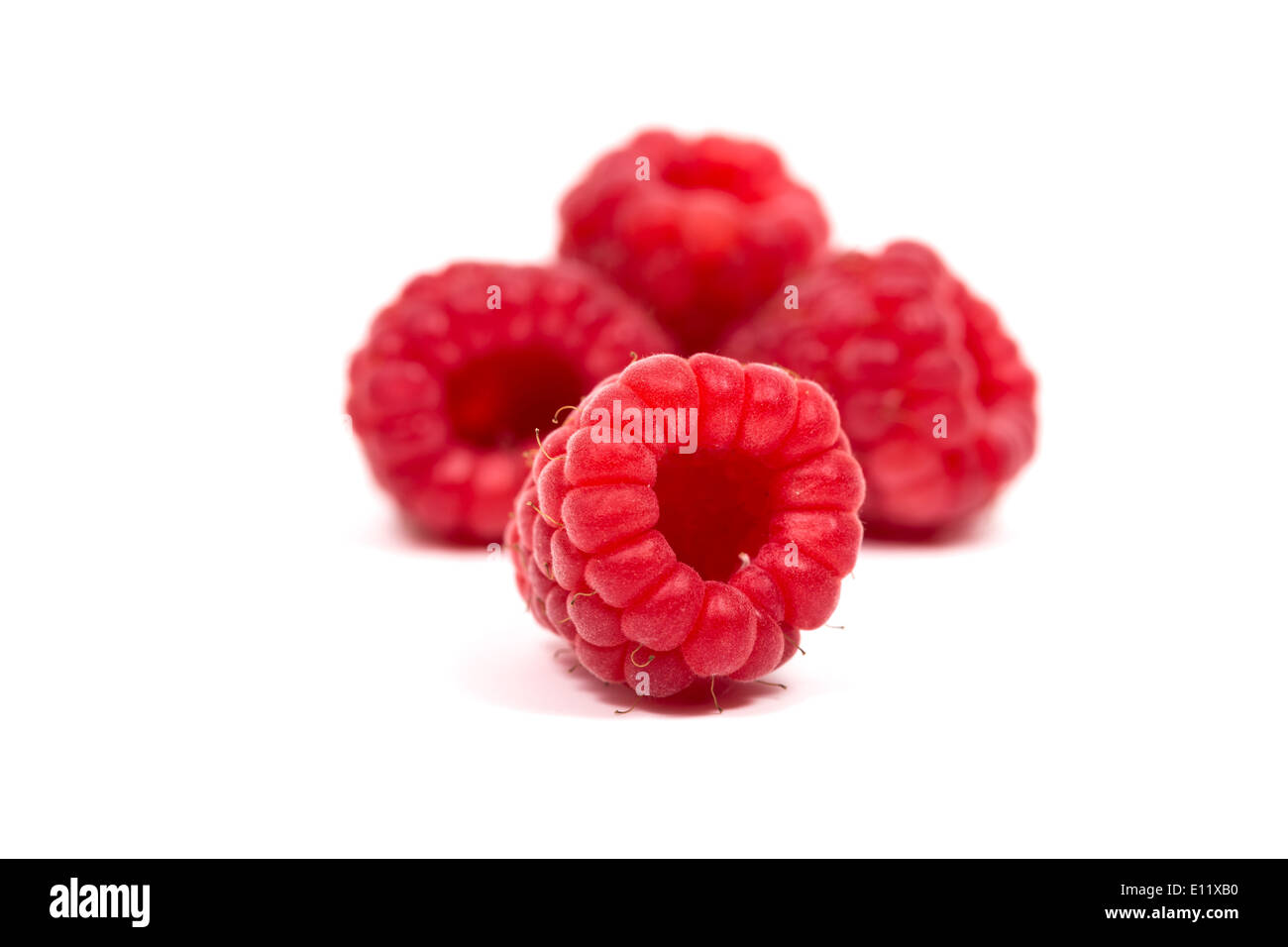 ripe red raspberry isolated on white background Stock Photo - Alamy