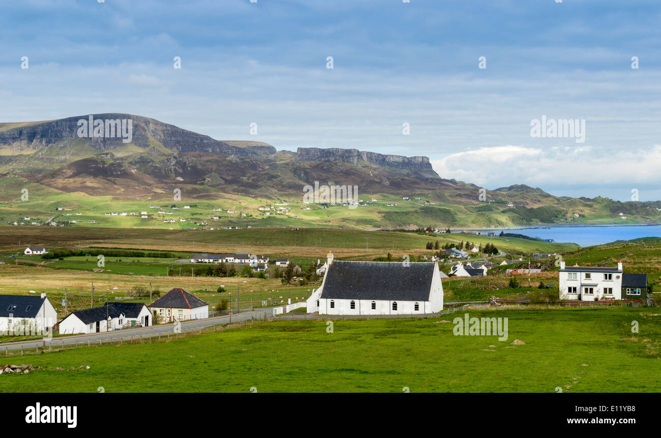 STAFFIN VILLAGE AND RANGE OF HILLS THE TROTTERNISH RIDGE BEHIND THE ...