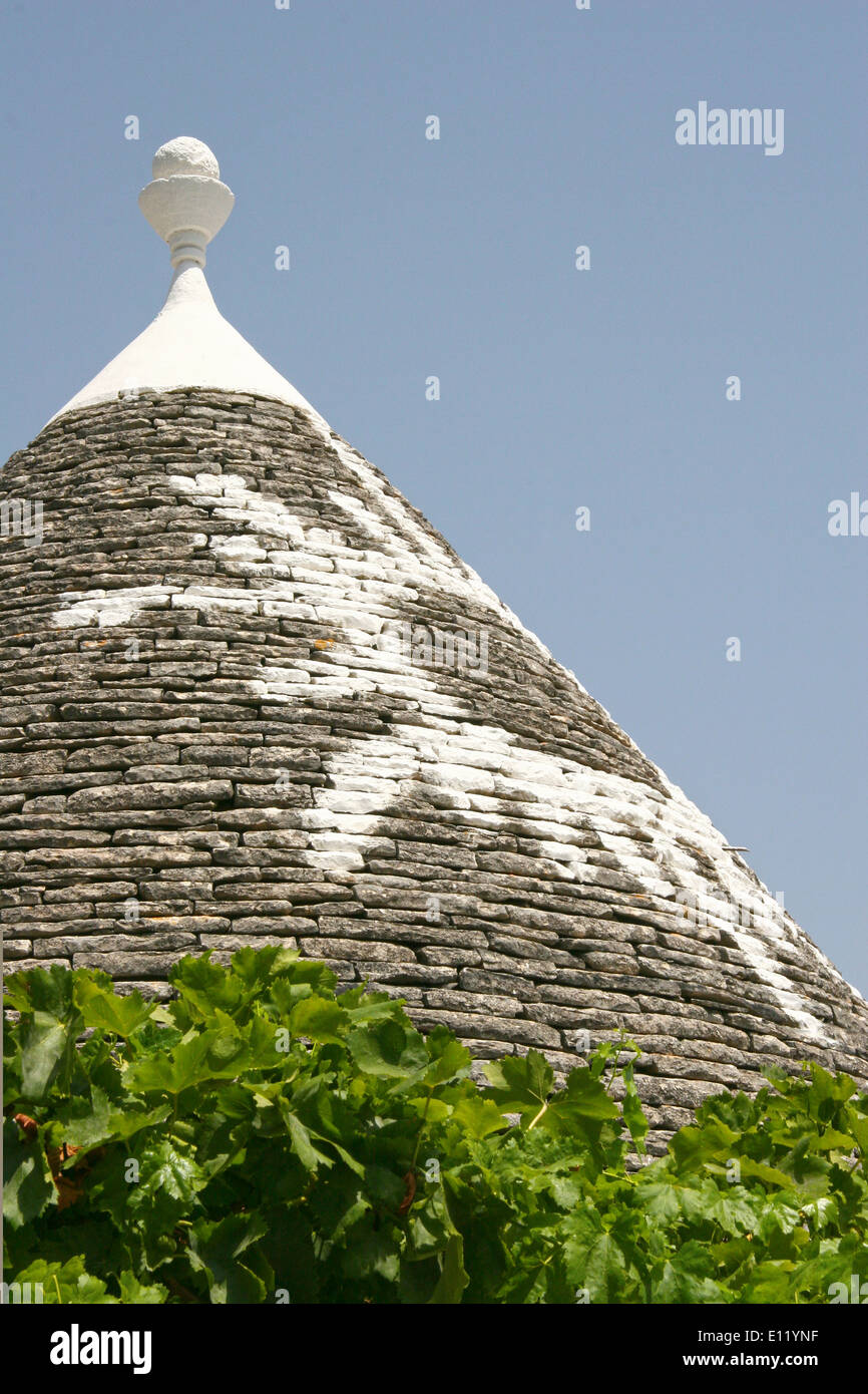 Painted Conical Trulli roofs in the center of Alberobello, Puglia ...