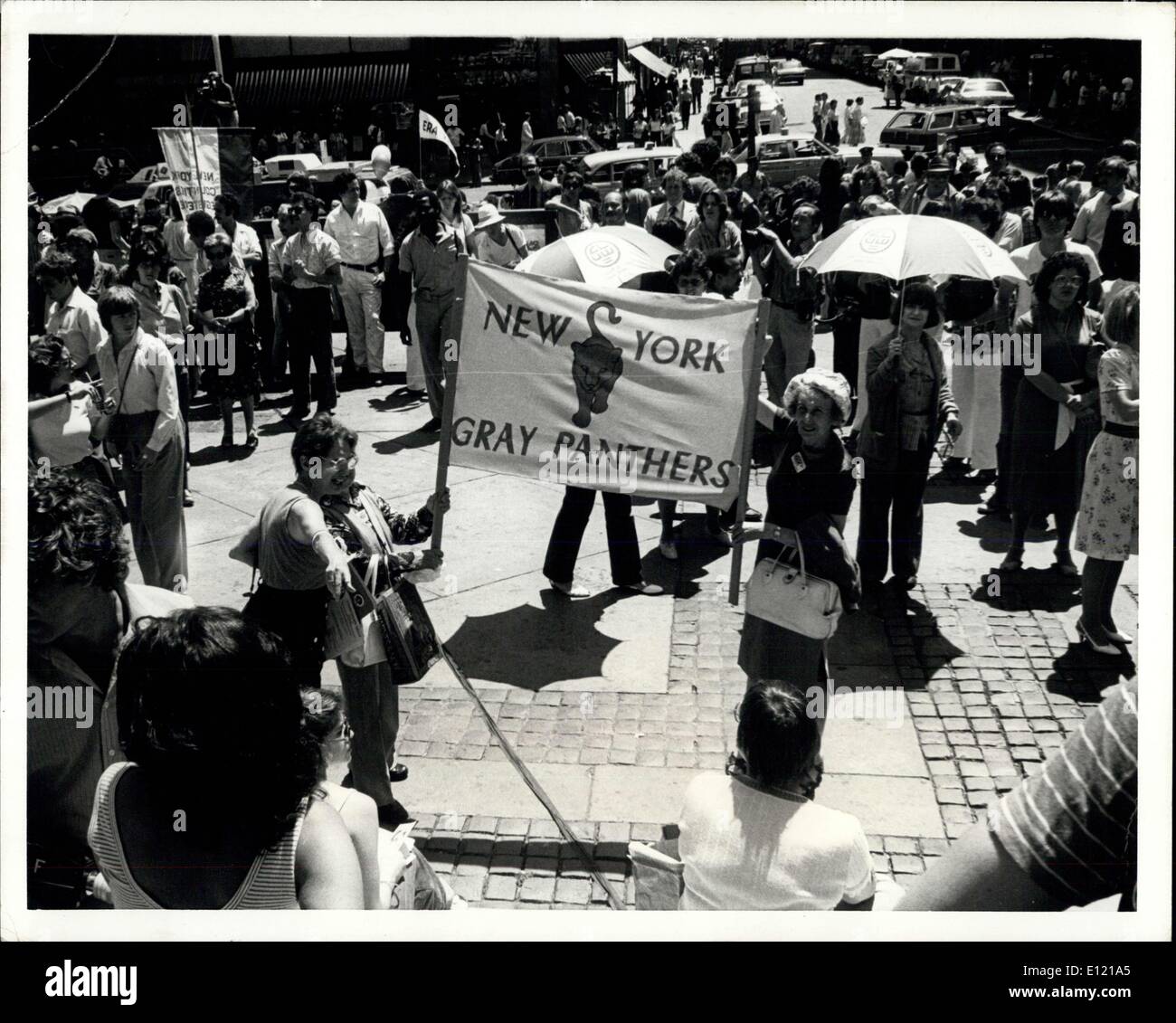 Now held hi-res stock photography and images - Alamy