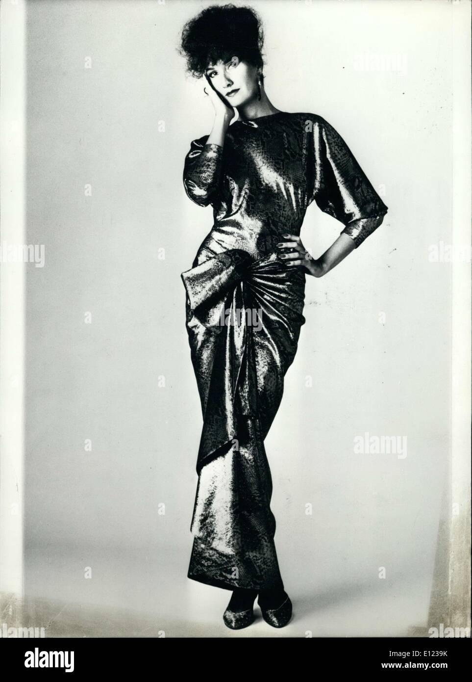 Aug. 25, 1982 - This Lanvin model is wearing a long gold dress with a ...