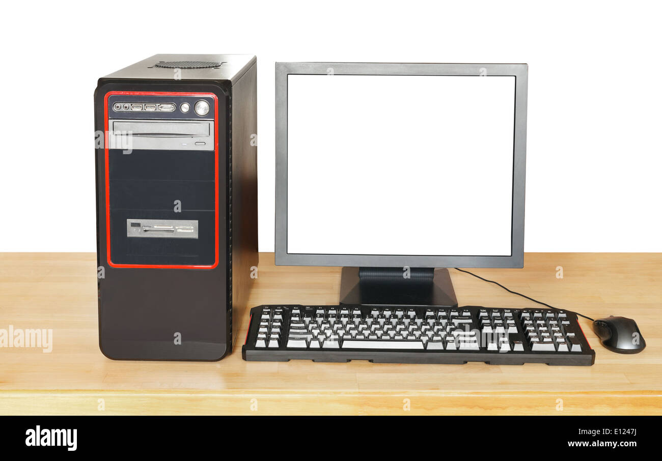 black desktop computer, display with cut out screen, keyboard, mouse on ...