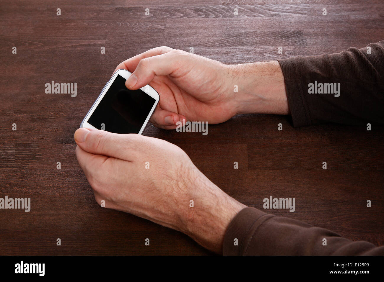 Male hands using mobile smart phone Stock Photo - Alamy