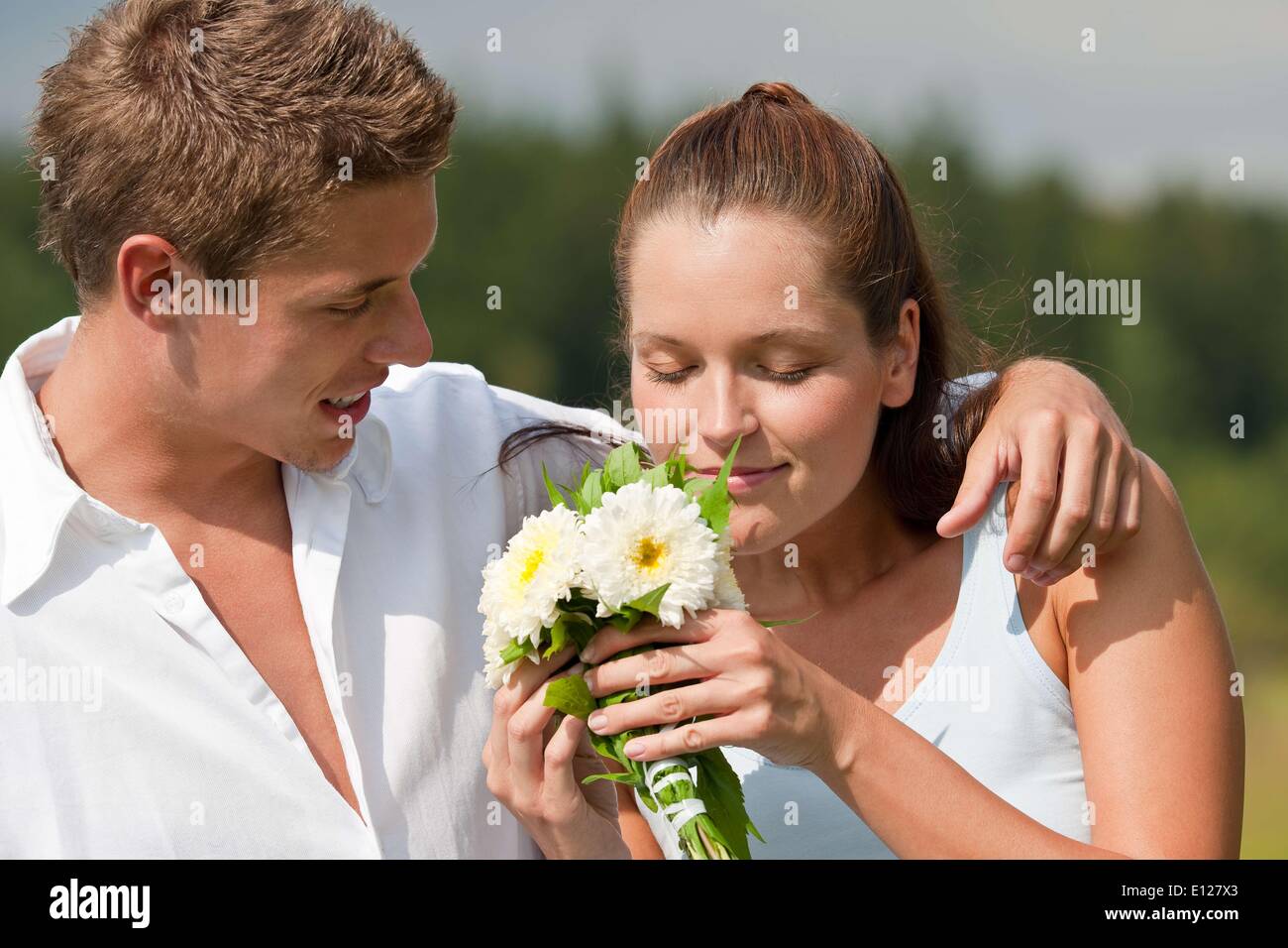 Aug. 28, 2009 - Aug. 28, 2009 - Romantic couple with flower in spring ...