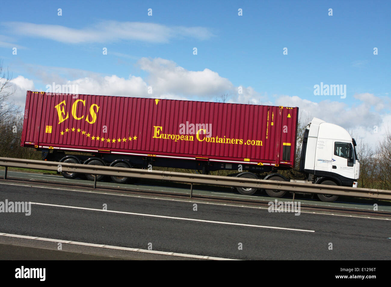 An Immingham Transport truck hauling an ECS shipping container along ...