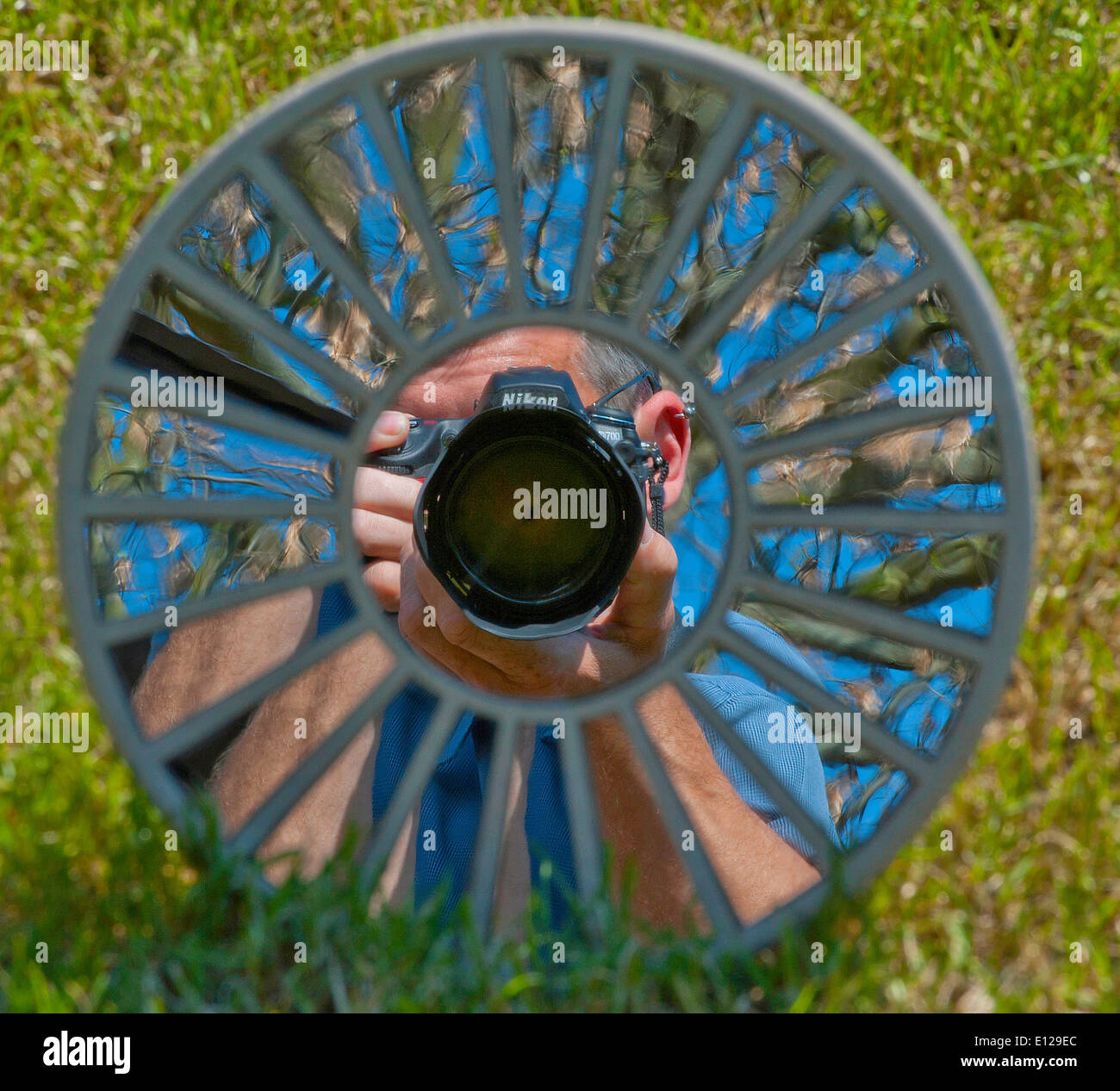 reflection of male photographer in a mirror Stock Photo - Alamy