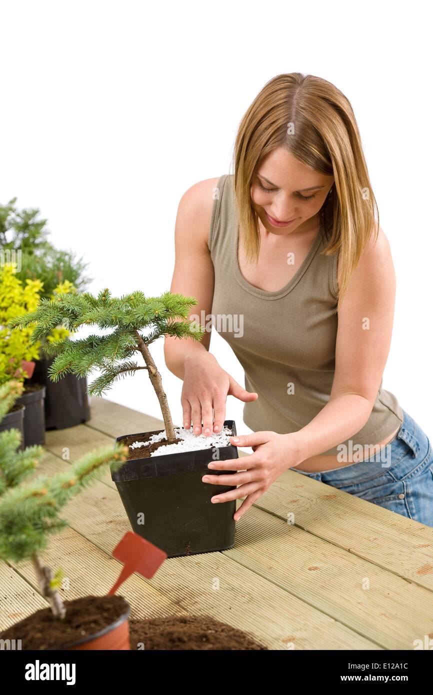 Black woman planting tree hi-res stock photography and images - Alamy