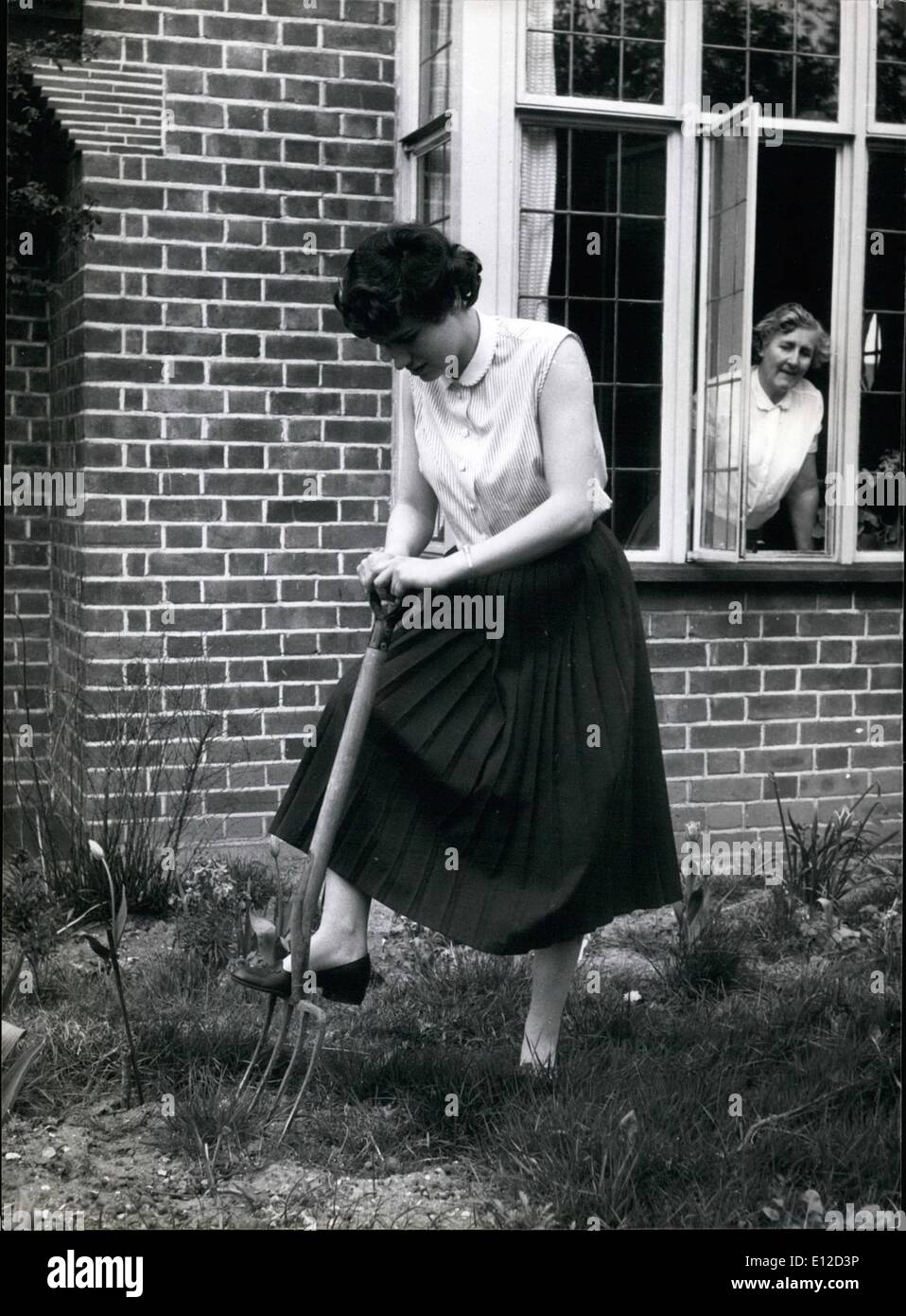 Dec. 19, 2011 - Margaret Edwards lends a hand in the home garden a good ...