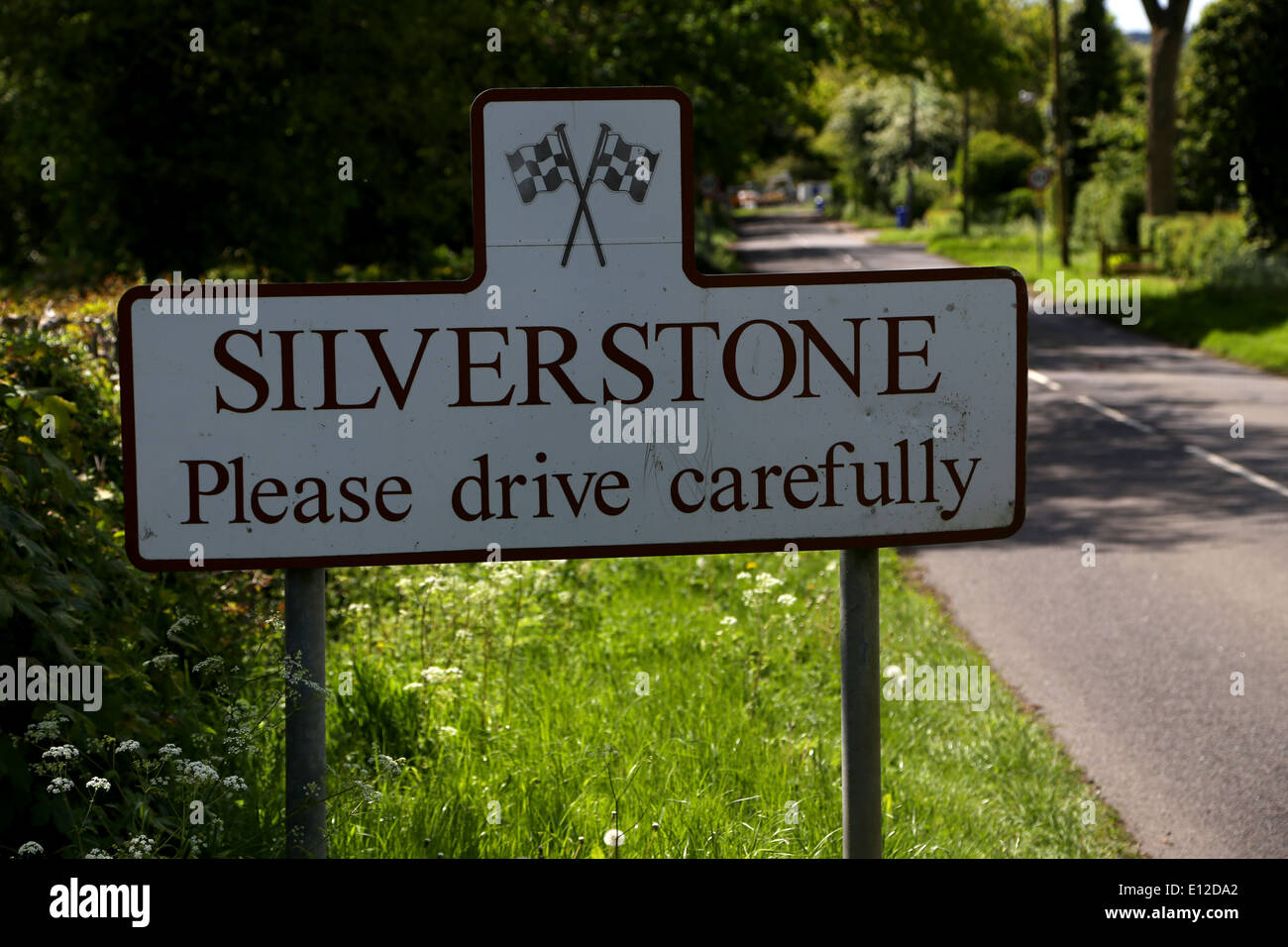 Silverstone "please drive carefully" sign Stock Photo - Alamy