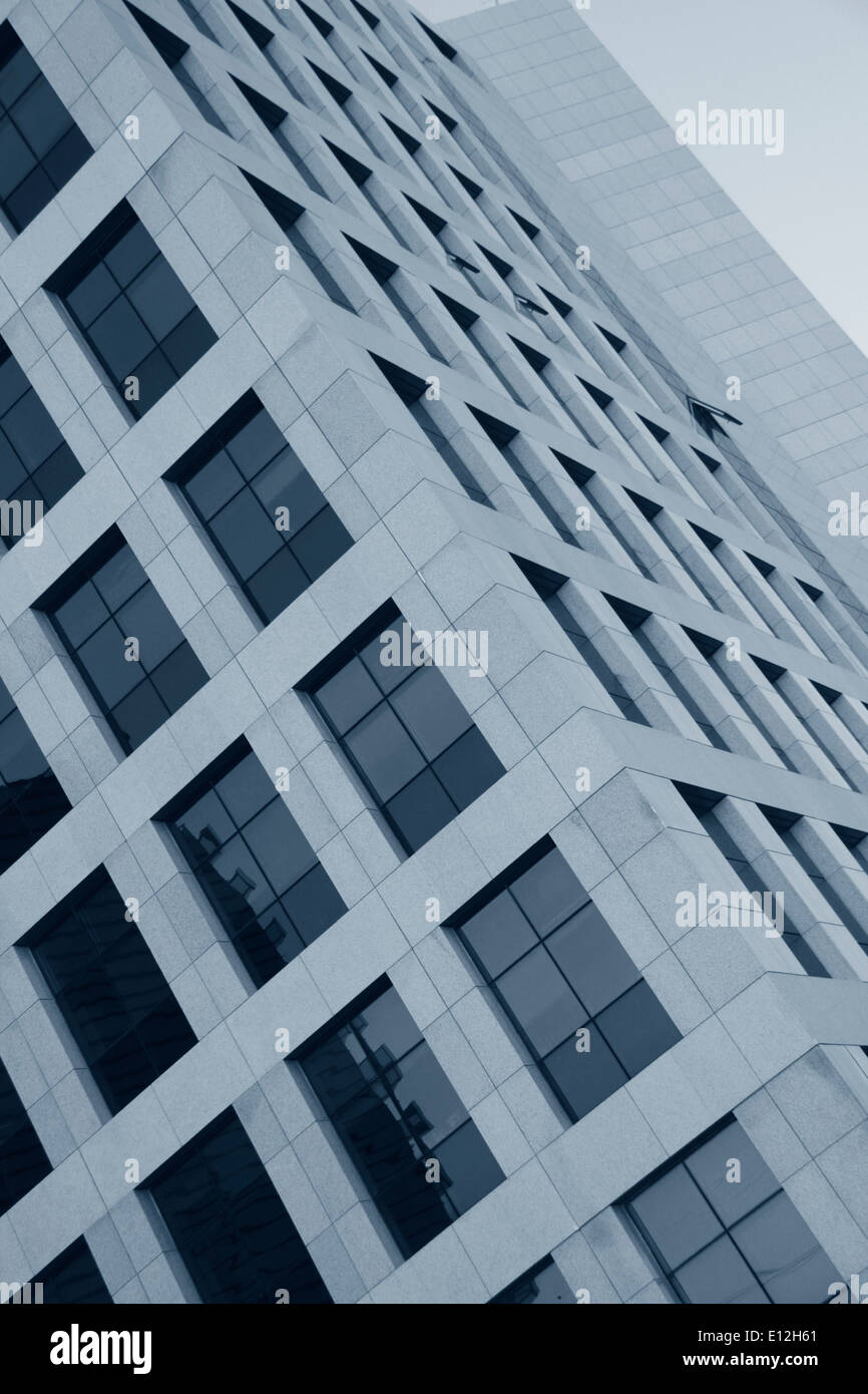 Modern architecture background in blue toning Stock Photo - Alamy