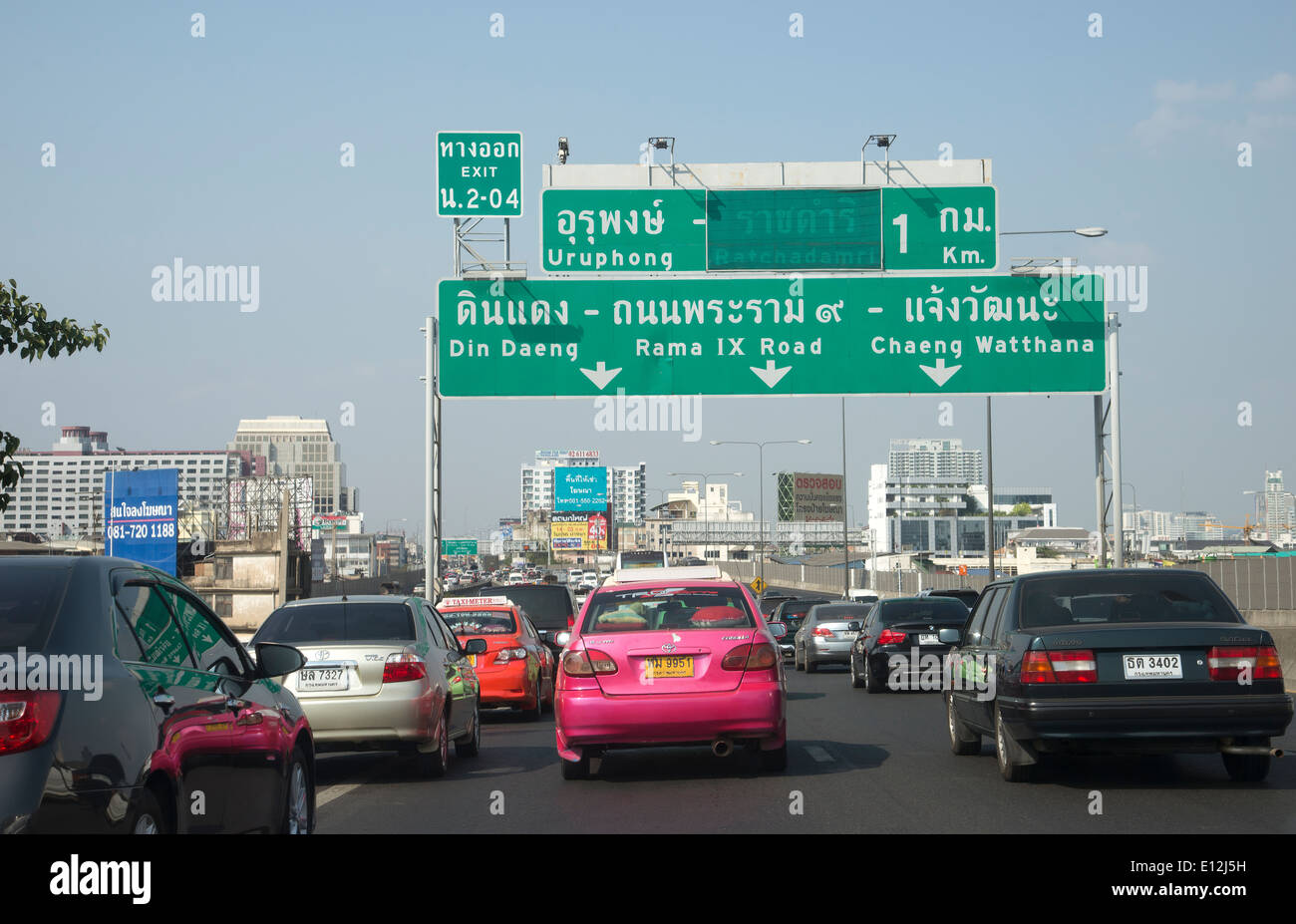 Gantry road signs in central Bangkok Thailand Congested traffic flow ...