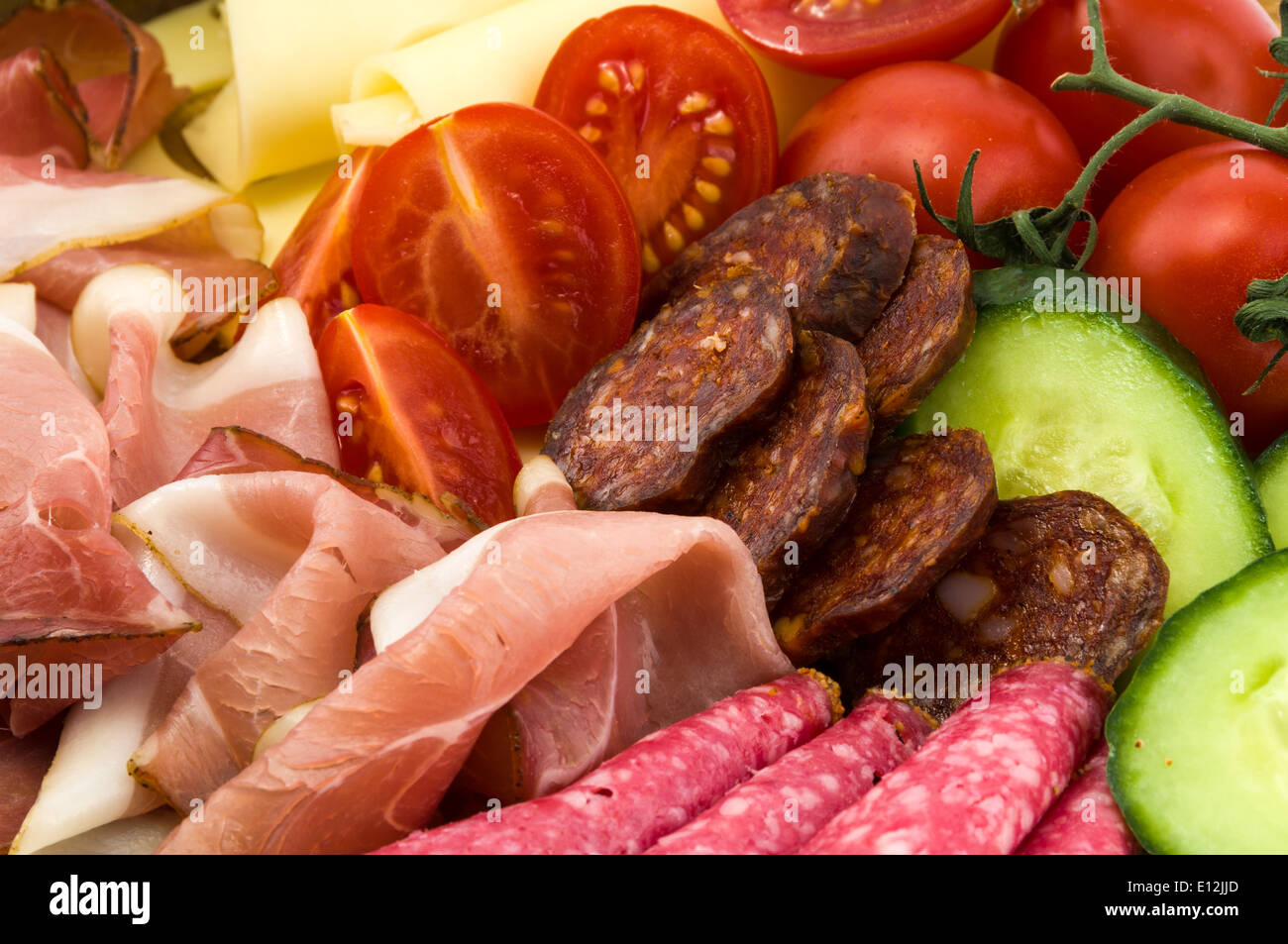 Cold meals, chees and vegetables on plate Stock Photo - Alamy