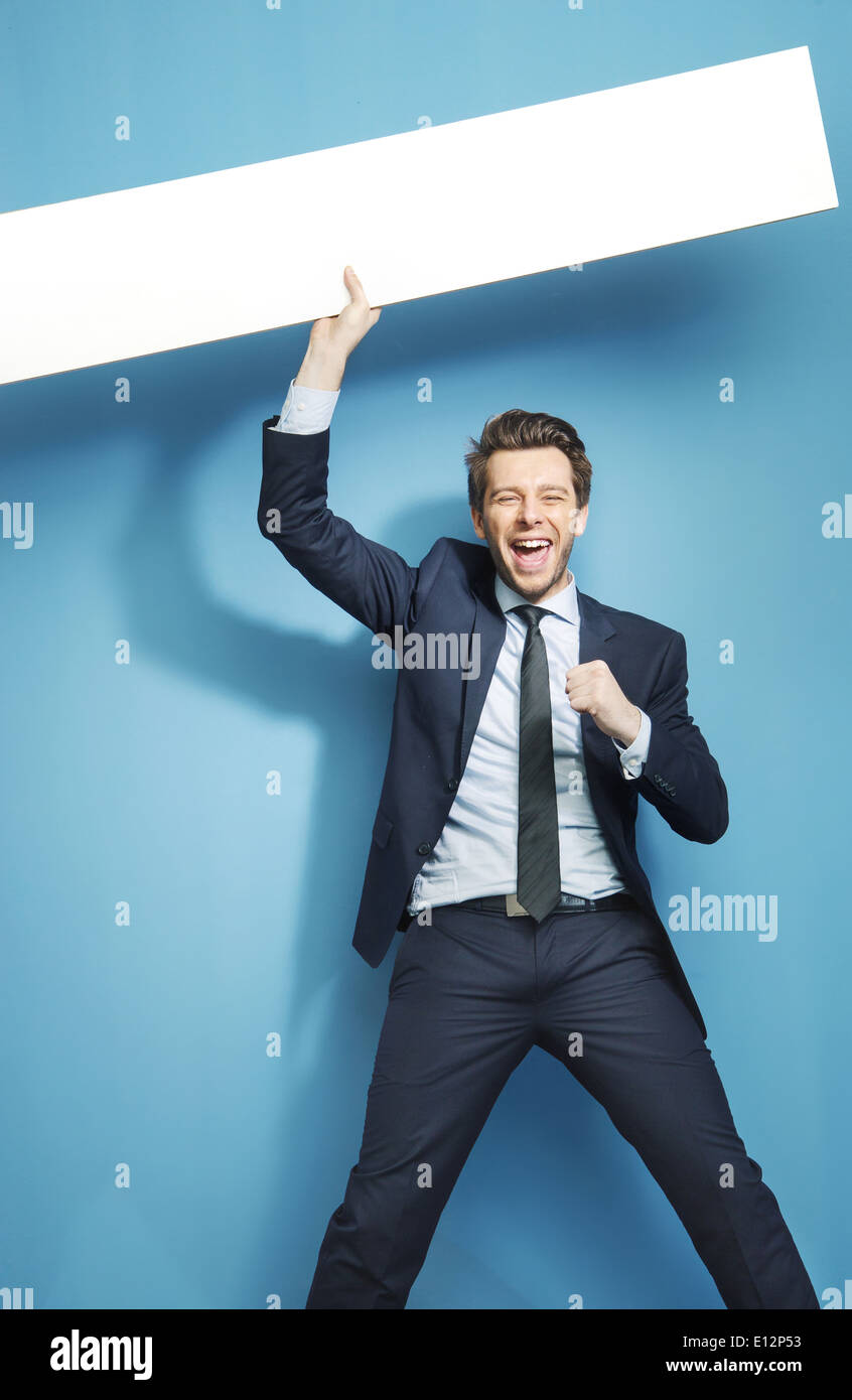 Laughing man advertising something hilarious Stock Photo - Alamy