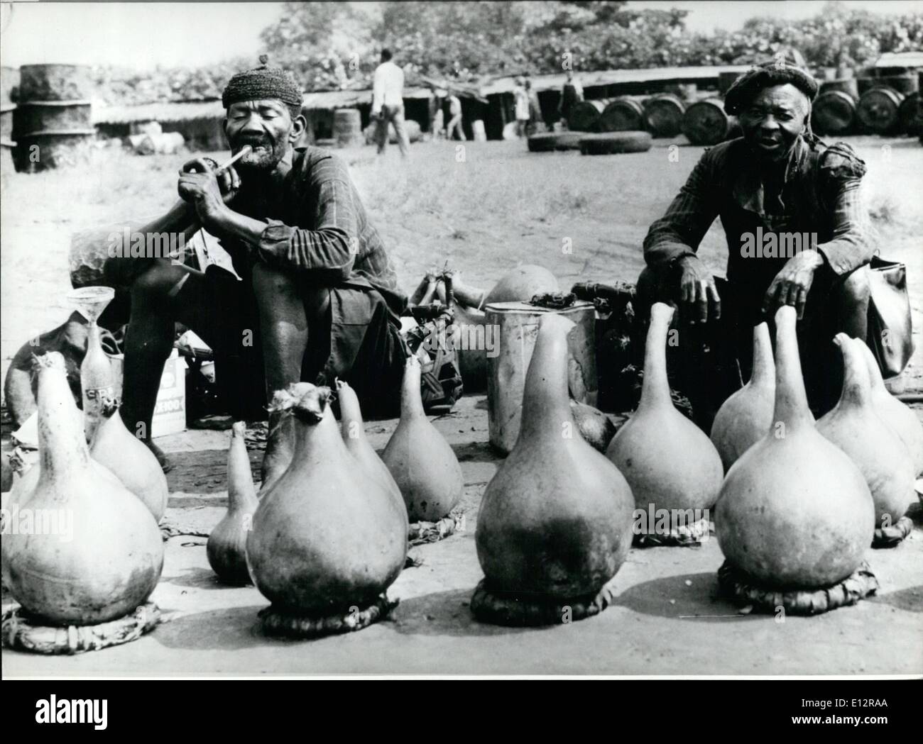 Feb. 24, 2012 - Take it easy: These two wine sellers at the market from ...