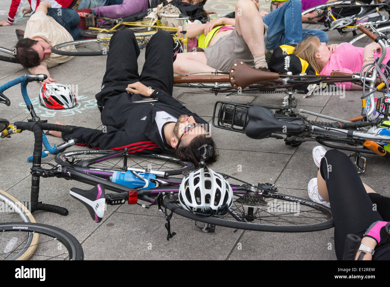 London UK. 21st May 2014. Cyclists hold a mass rally and die-in on the ...