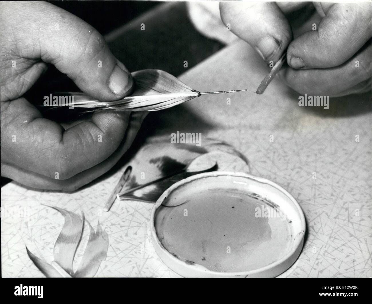 Feb. 25, 2012 - Needles are inserted in replacement feathers, to form ...