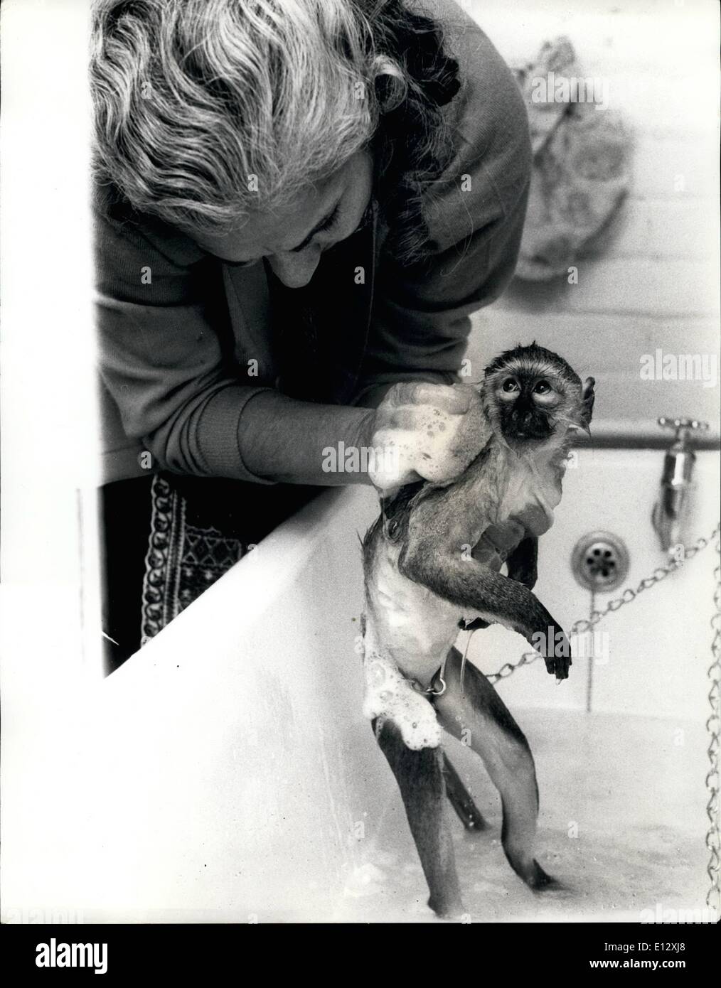 Feb. 25, 2012 - It's time for bed and bath from Mum: Mrs. Bailey with ...