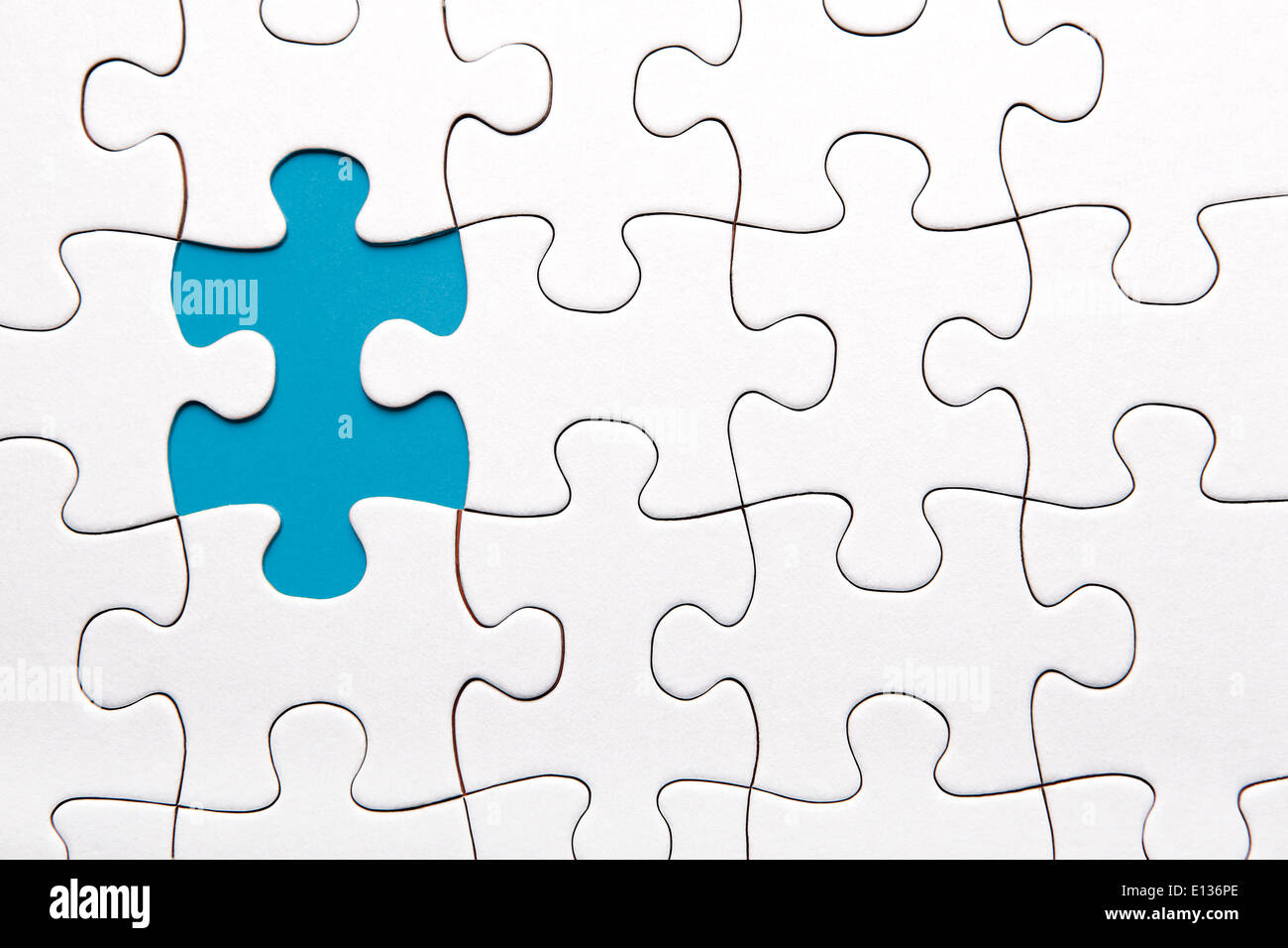 Puzzle piece missing on blue background Stock Photo - Alamy