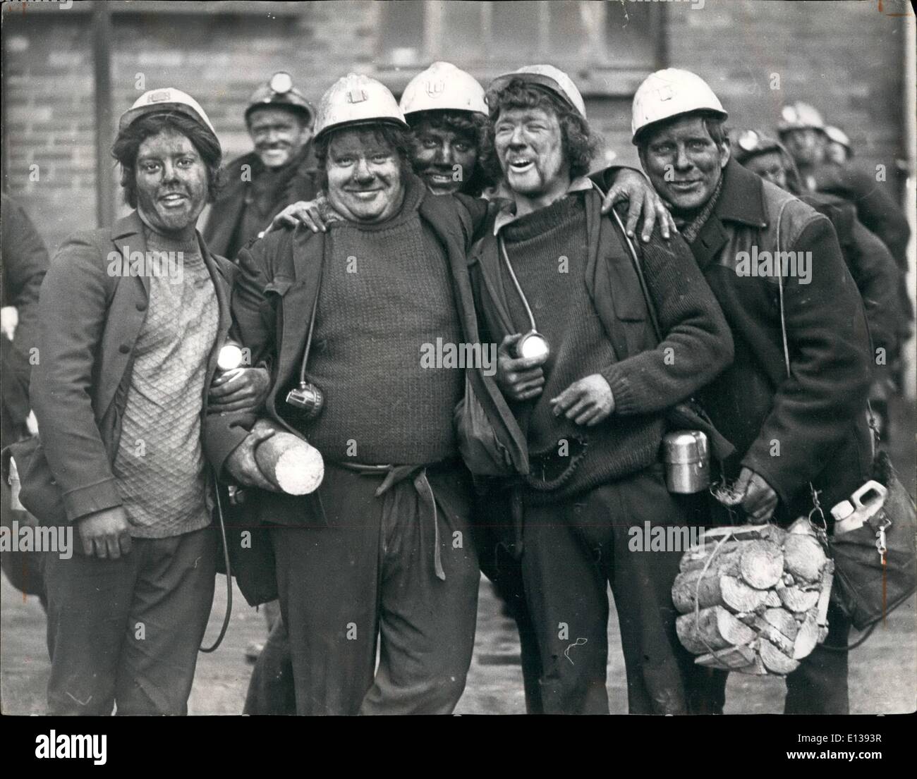Feb. 29, 2012 - Grime covered miners get together after completing ...