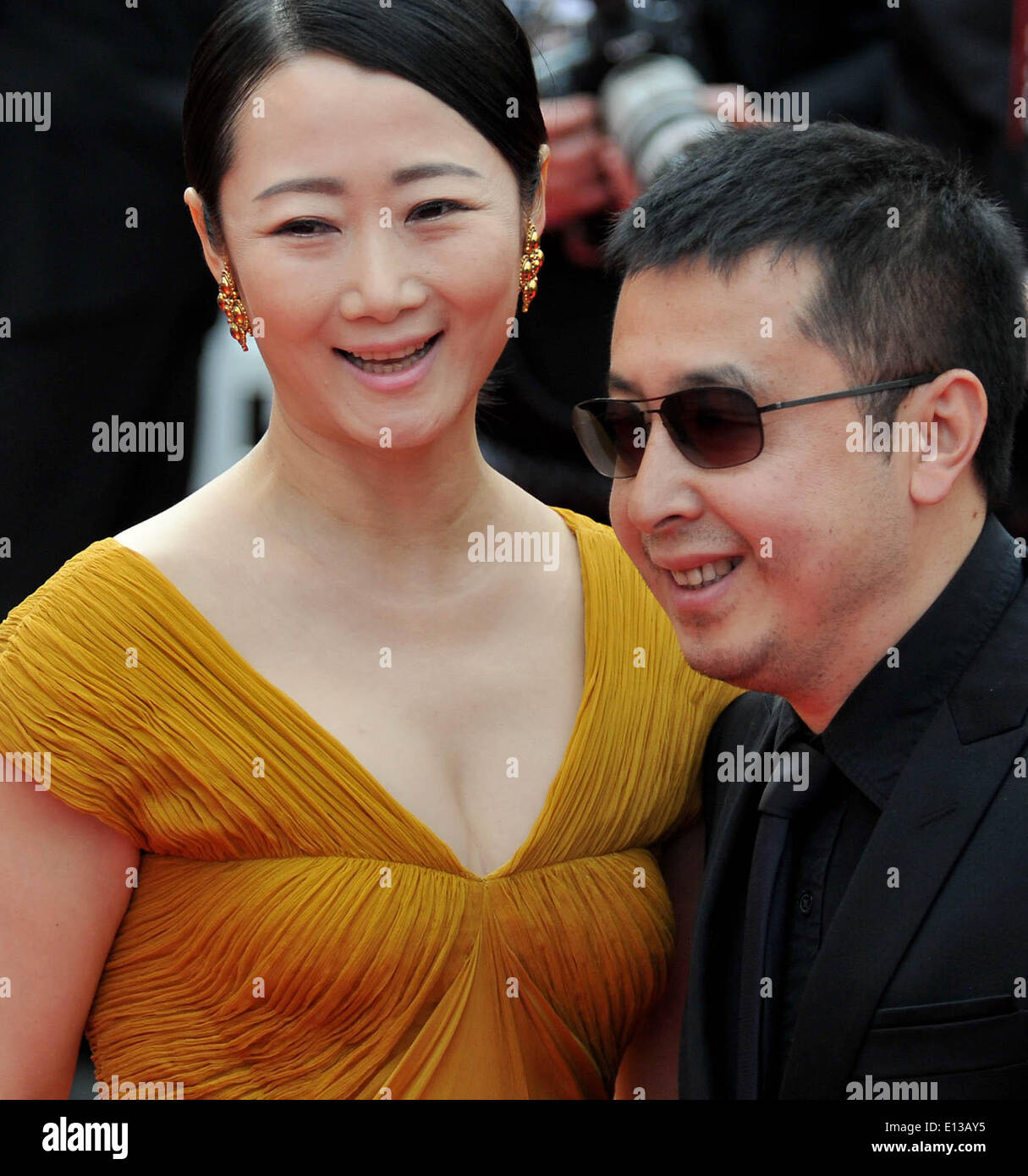 Cannes, France. 21st May, 2014. Chinese director Jia Zhangke (R ...