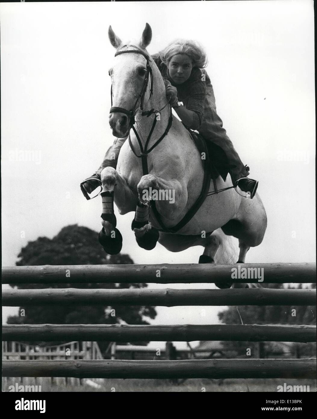 Feb. 29, 2012 - Ann Moore and April Love clear a practice jump with ...