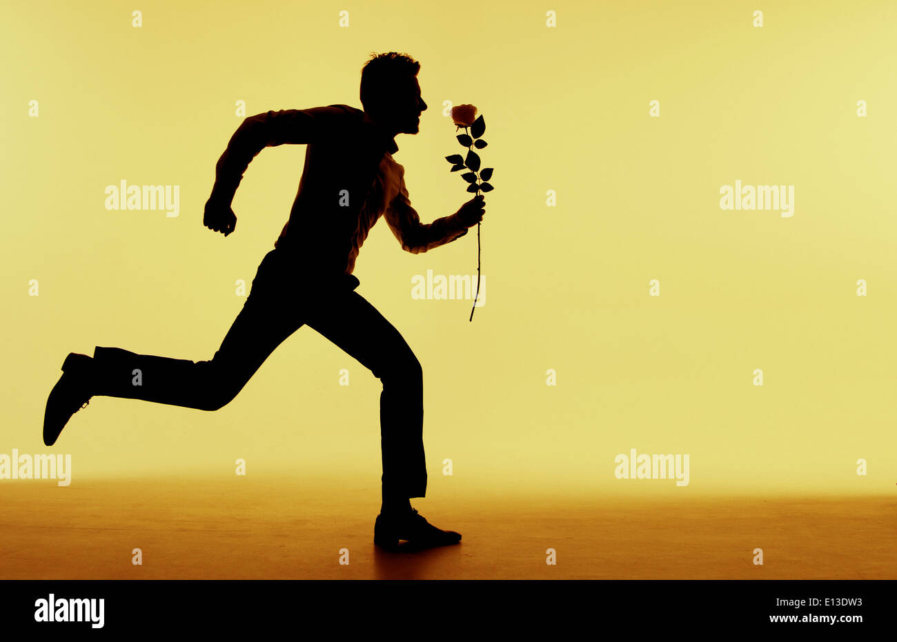 Handsome guy running to his girlfriend Stock Photo - Alamy