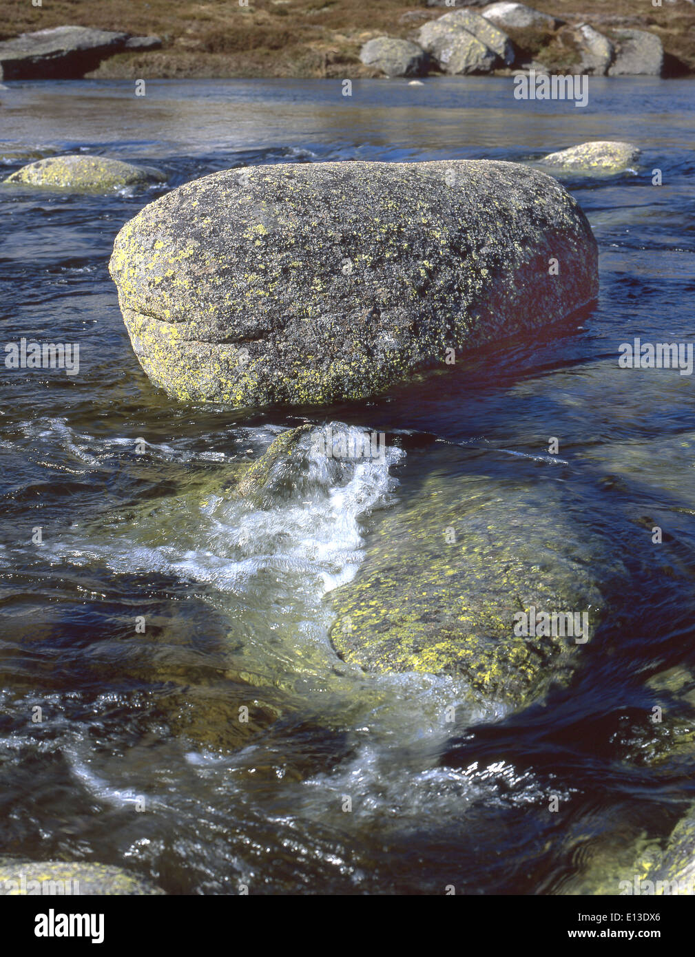 Boulders in stream Stock Photo - Alamy