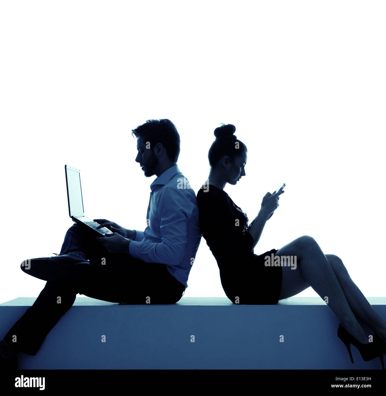Young couple addicted to the network Stock Photo - Alamy