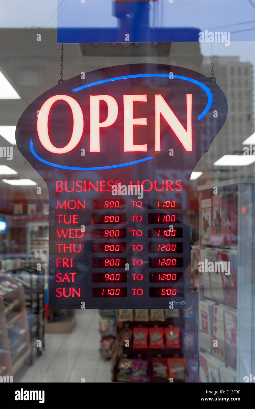 Open sign in a store Stock Photo - Alamy