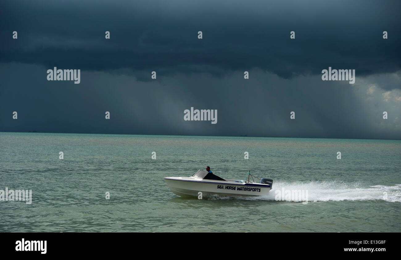 Monsoon rain & storm clouds on Batu Feringgi Beach, Penang Island ...