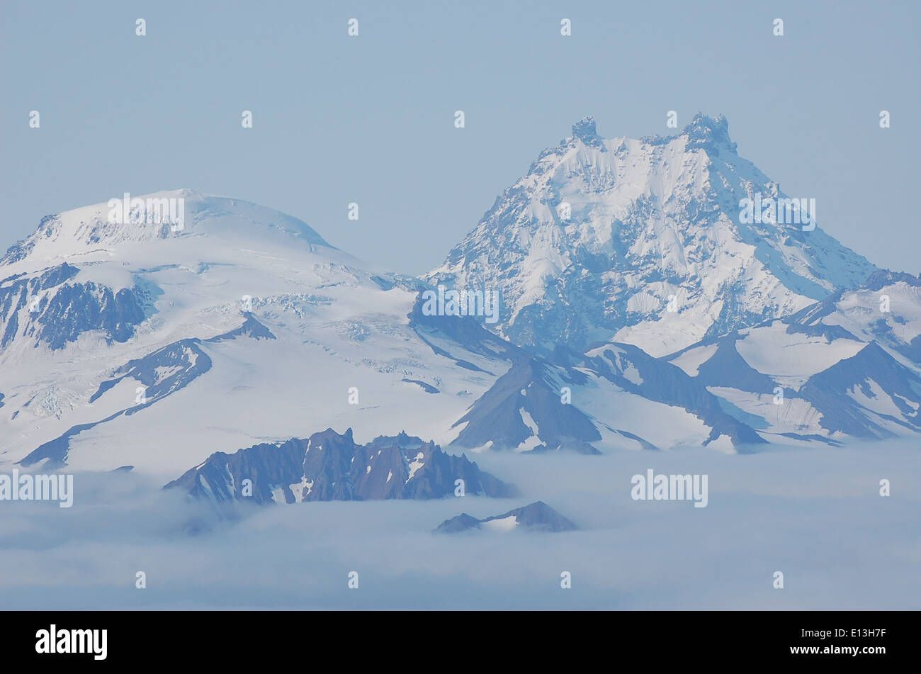 Roundtop and Isanotski Volcanoes Stock Photo - Alamy