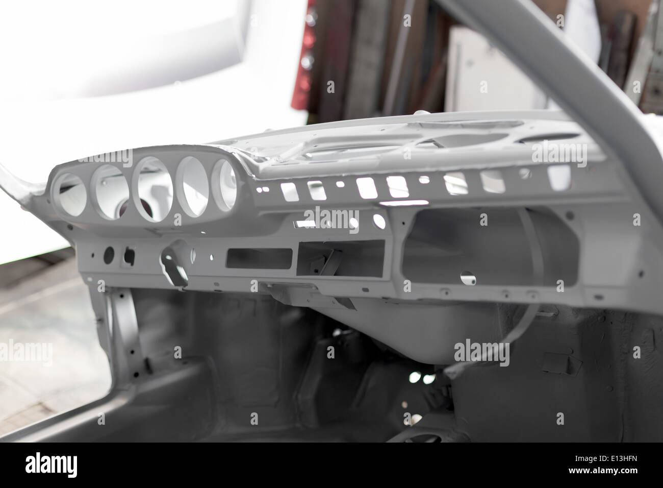 Car frame in a garage Stock Photo - Alamy