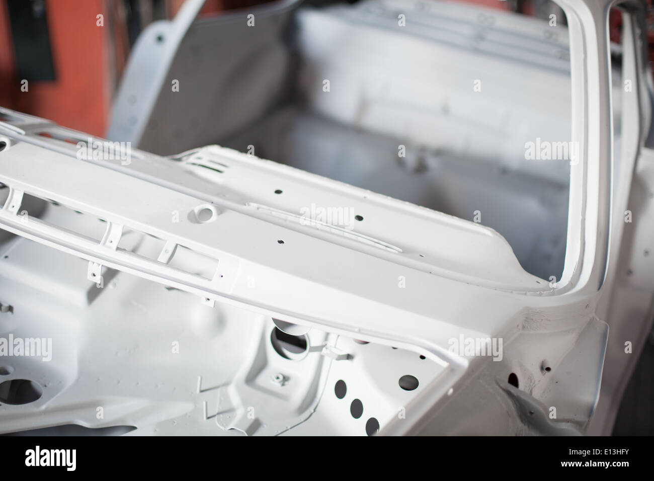 Car frame in a garage Stock Photo - Alamy