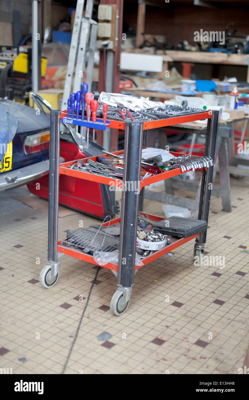 Work tools in a car garage Stock Photo - Alamy