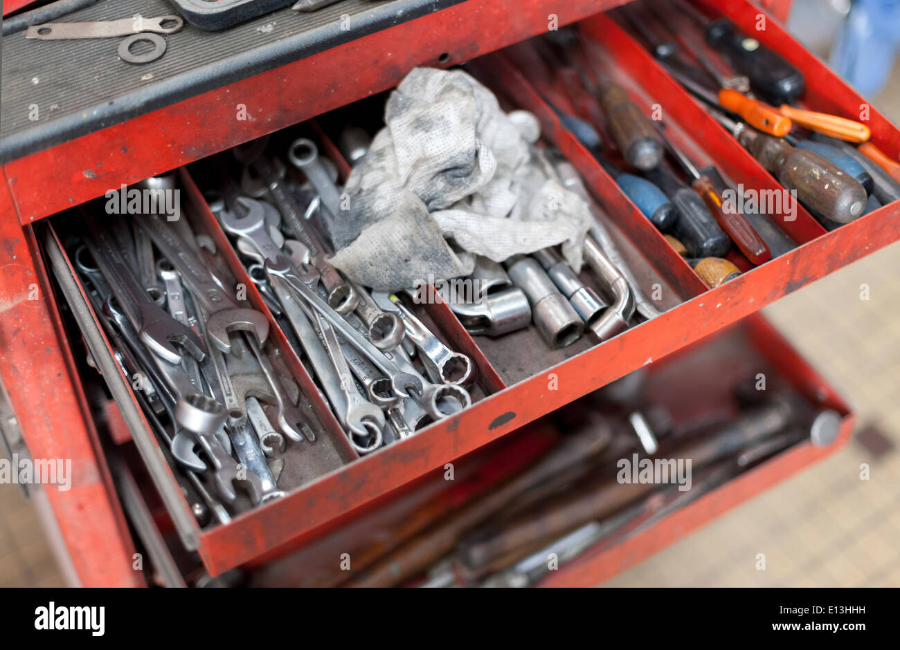 Work tools in a car garage Stock Photo - Alamy