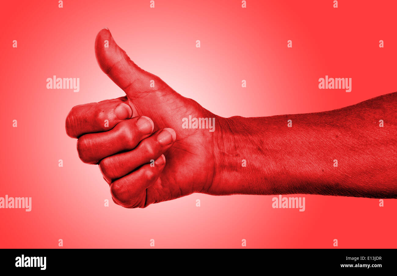 Old woman with arthritis giving the thumbs up sign, red skin Stock ...