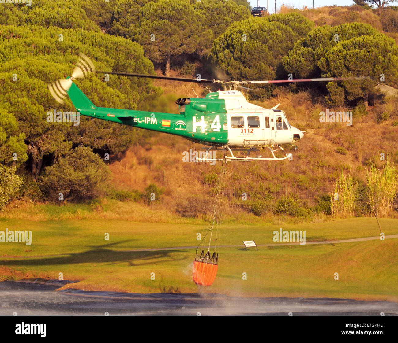Dangling from helicopter hi-res stock photography and images - Alamy