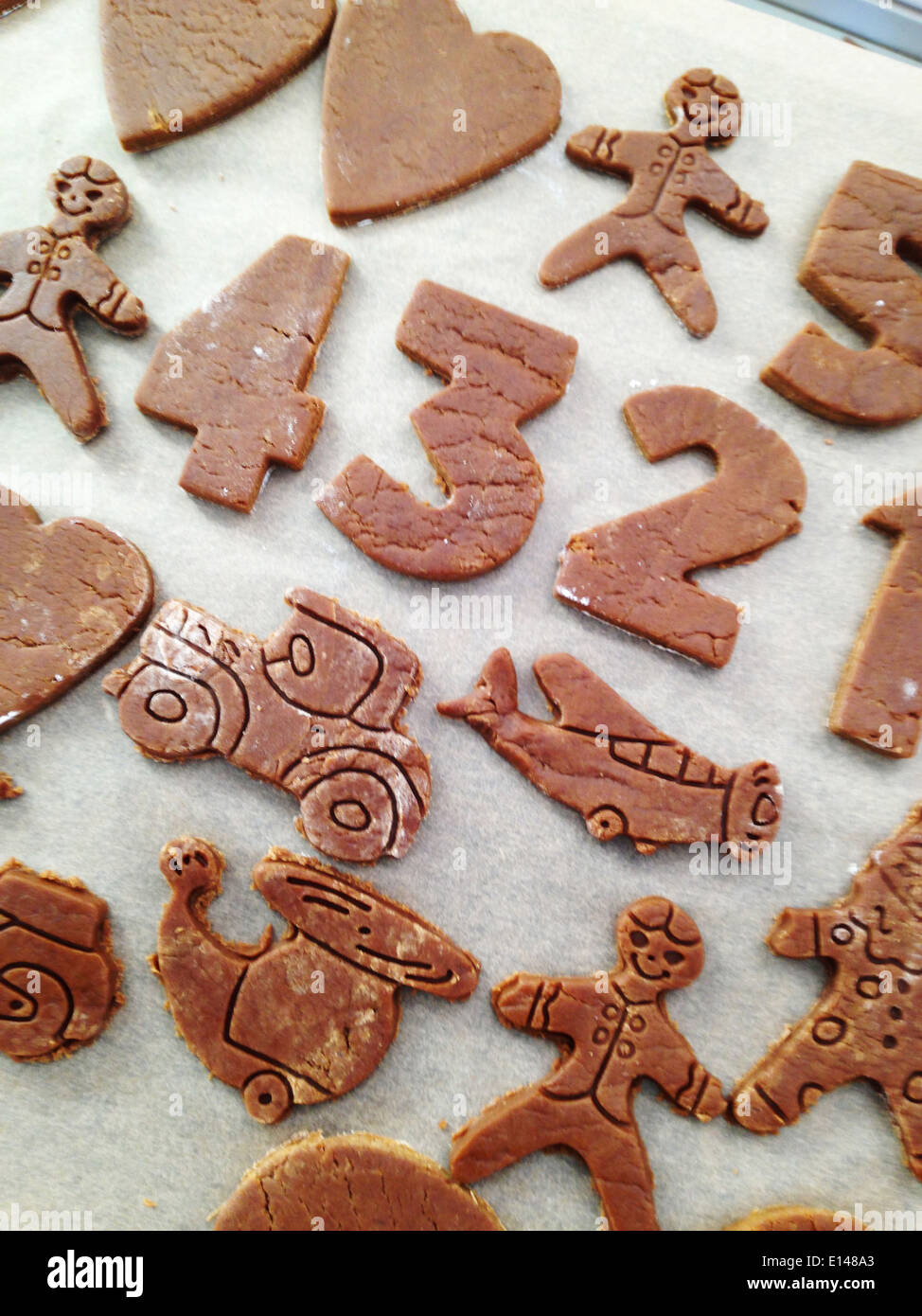 Cookie shapes on sheet ready to bake Stock Photo - Alamy