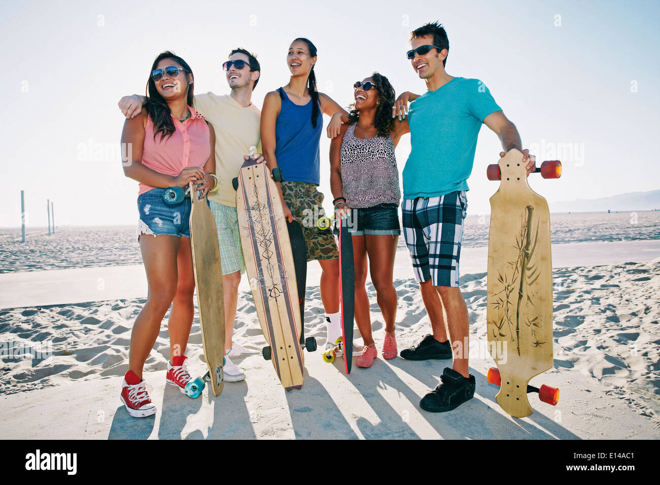 Group multicultural friends holding hi-res stock photography and images ...