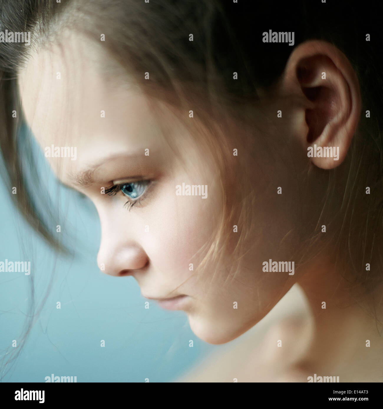 Woman face looking down profile hi-res stock photography and images - Alamy